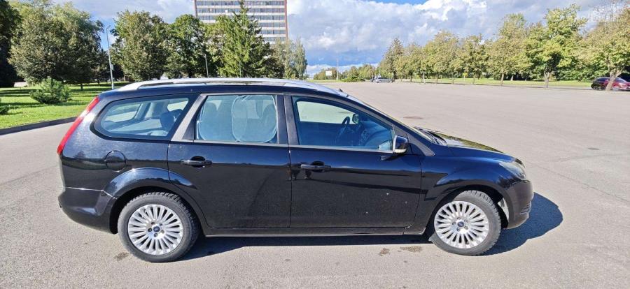 Black Ford Focus 2009 in Alytus, with an engine capacity of 1.60 L and mileage of 310 thousand km for 2100 €, photo 12 on AUTOMOTO.COM.LV
