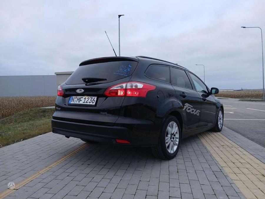 Black Ford Focus 2011 in Marijampole, with an engine capacity of 1.56 L and mileage of 202 thousand km for 3050 €, photo 12 on AUTOMOTO.COM.LV