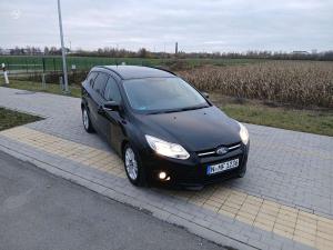 Black Ford Focus 2011 in Marijampole, with an engine capacity of 1.56 L and mileage of 202 thousand km for 3050 €, photo 13 on AUTOMOTO.COM.LV