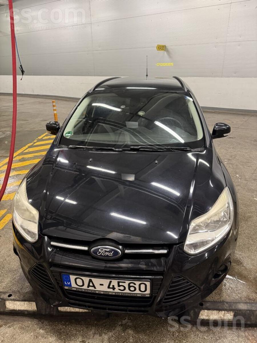 Black Ford Focus 2011 in Bauska, with an engine capacity of 1.60 L and mileage of 260 thousand km for 3450 €, photo 1 on AUTOMOTO.COM.LV