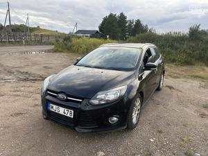 Black Ford Focus 2011 in Vilnius, with an engine capacity of 2.00 L and mileage of 269 thousand km for 1250 €, photo  on AUTOMOTO.COM.LV