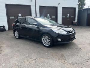 Black Ford Focus 2011 in Utena, with an engine capacity of 1.60 L and mileage of 132 thousand km for 3900 €, photo 5 on AUTOMOTO.COM.LV