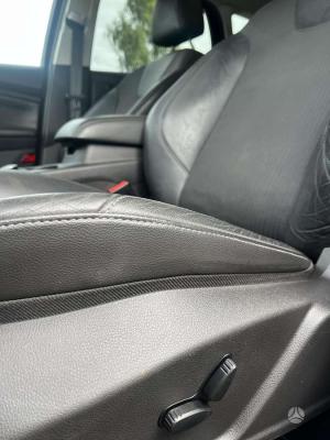 Black Ford Focus 2011 in Utena, with an engine capacity of 1.60 L and mileage of 132 thousand km for 3900 €, photo 18 on AUTOMOTO.COM.LV