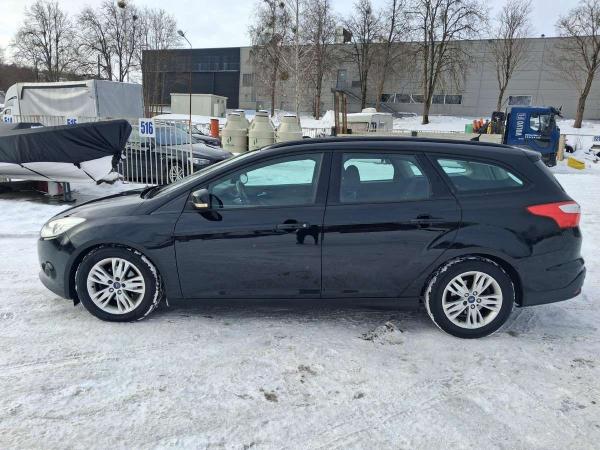 Black Ford Focus 2012 in Alytus, with an engine capacity of 1.56 L and mileage of 230 thousand km for 3350 €, photo 2 on AUTOMOTO.COM.LV