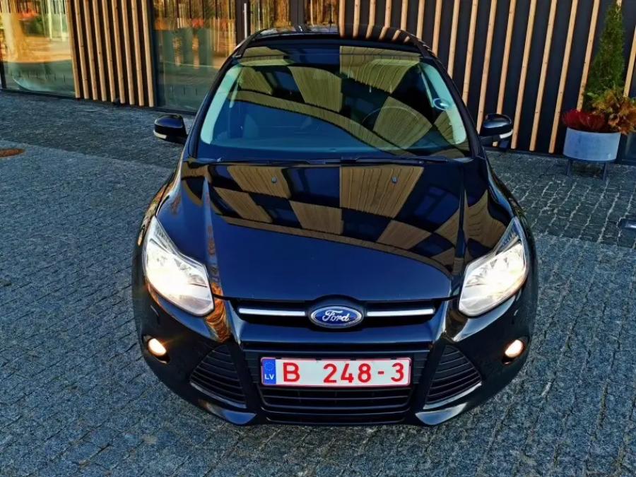 Black Ford Focus 2012 in Riga, with an engine capacity of 1.60 L and mileage of 231 thousand km for 5990 €, photo 3 on AUTOMOTO.COM.LV