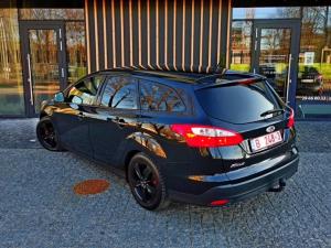 Black Ford Focus 2012 in Riga, with an engine capacity of 1.60 L and mileage of 231 thousand km for 5990 €, photo 5 on AUTOMOTO.COM.LV