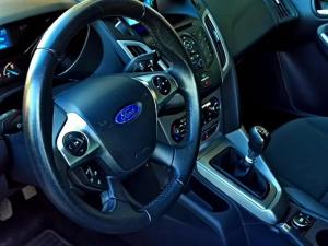 Black Ford Focus 2012 in Riga, with an engine capacity of 1.60 L and mileage of 231 thousand km for 5990 €, photo 16 on AUTOMOTO.COM.LV