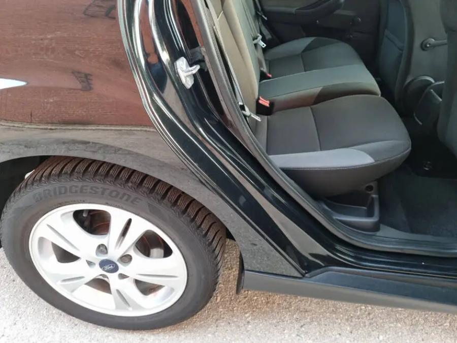 Black Ford Focus 2012 in Jekabpils, with an engine capacity of 1.60 L and mileage of 278 thousand km for 4750 €, photo 17 on AUTOMOTO.COM.LV