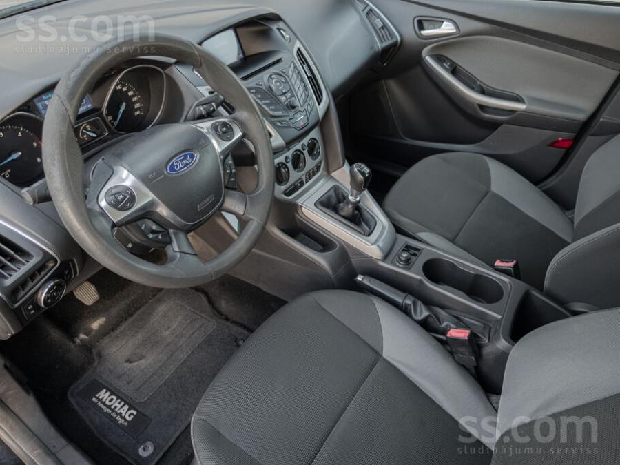 Black Ford Focus 2012 in Liepaja, with an engine capacity of 1.60 L and mileage of 309 thousand km for 3495 €, photo 11 on AUTOMOTO.COM.LV
