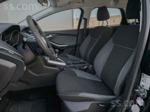 Black Ford Focus 2012 in Liepaja, with an engine capacity of 1.60 L and mileage of 309 thousand km for 3495 €, photo 12 on AUTOMOTO.COM.LV