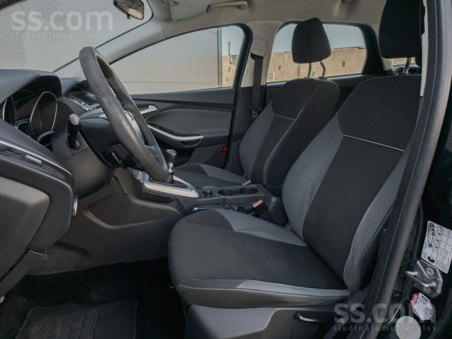 Black Ford Focus 2012 in Liepaja, with an engine capacity of 1.60 L and mileage of 309 thousand km for 3495 €, photo 12 on AUTOMOTO.COM.LV