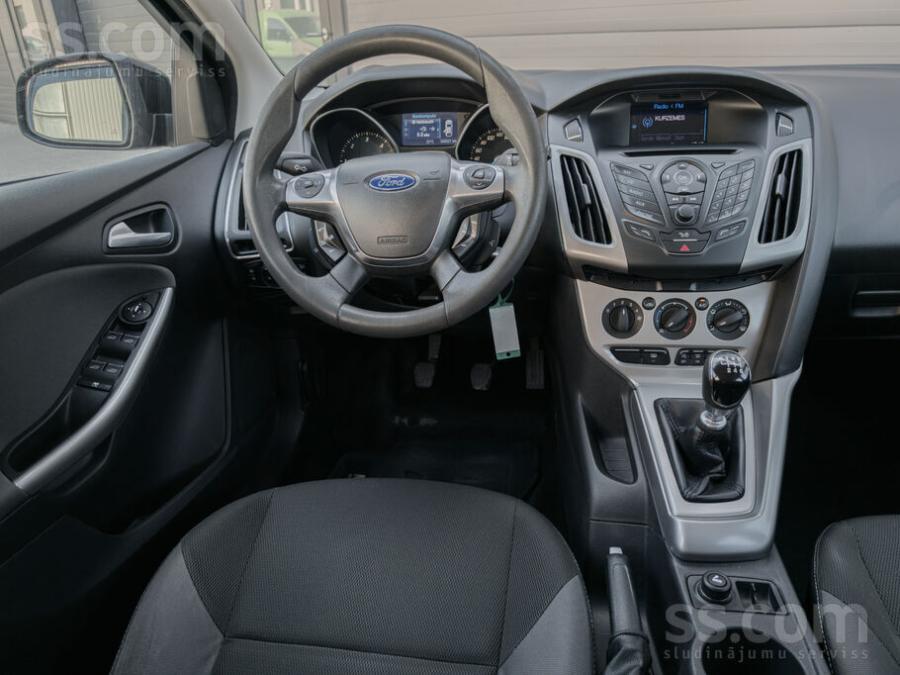 Black Ford Focus 2012 in Liepaja, with an engine capacity of 1.60 L and mileage of 309 thousand km for 3495 €, photo 13 on AUTOMOTO.COM.LV