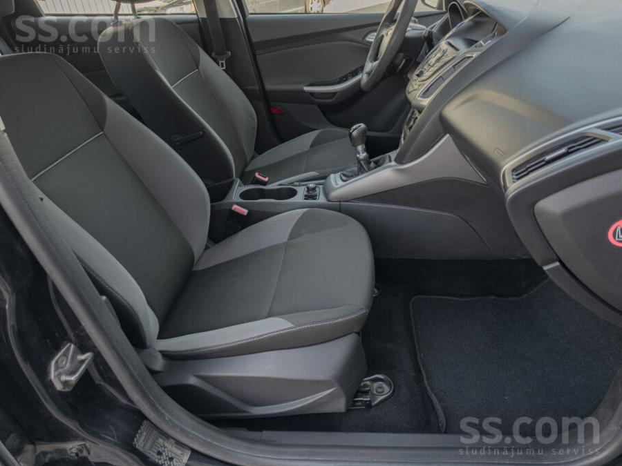 Black Ford Focus 2012 in Liepaja, with an engine capacity of 1.60 L and mileage of 309 thousand km for 3495 €, photo 16 on AUTOMOTO.COM.LV