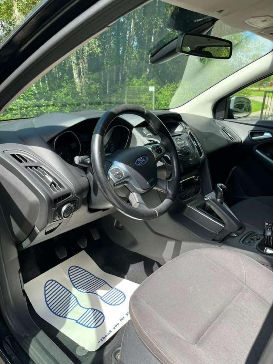 Black Ford Focus 2013 in Trakai, with an engine capacity of 1.00 L and mileage of 229 thousand km for 3699 €, photo 9 on AUTOMOTO.COM.LV