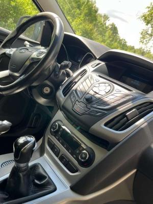 Black Ford Focus 2013 in Trakai, with an engine capacity of 1.00 L and mileage of 229 thousand km for 3699 €, photo 12 on AUTOMOTO.COM.LV