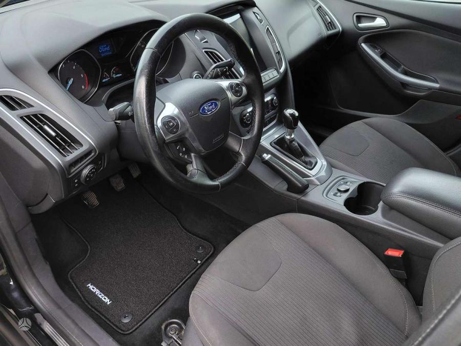 Black Ford Focus 2014 in Kaunas, with an engine capacity of 1.56 L and mileage of 302 thousand km for 4500 €, photo 13 on AUTOMOTO.COM.LV