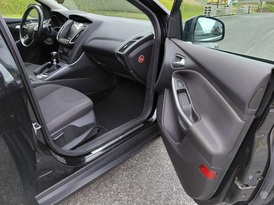 Black Ford Focus 2014 in Kaunas, with an engine capacity of 1.56 L and mileage of 302 thousand km for 4500 €, photo 22 on AUTOMOTO.COM.LV