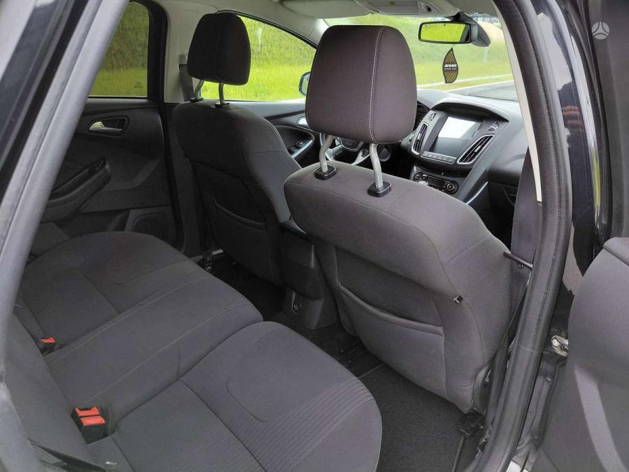 Black Ford Focus 2014 in Kaunas, with an engine capacity of 1.56 L and mileage of 302 thousand km for 4500 €, photo 30 on AUTOMOTO.COM.LV