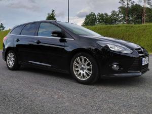 Black Ford Focus 2014 in Kaunas, with an engine capacity of 1.56 L and mileage of 302 thousand km for 3900 €, photo 6 on AUTOMOTO.COM.LV