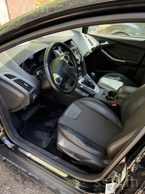 Black Ford Focus 2014 in Riga, with an engine capacity of 1.00 L and mileage of 185 thousand km for 3100 €, photo 3 on AUTOMOTO.COM.LV