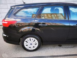 Black Ford Focus 2015 in Klaipeda, with an engine capacity of 1.00 L and mileage of 94 thousand km for 3990 €, photo 12 on AUTOMOTO.COM.LV
