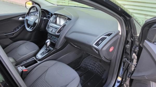 Black Ford Focus 2016 in Riga, with an engine capacity of 2.00 L and mileage of 260 thousand km for 5890 €, photo 5 on AUTOMOTO.COM.LV