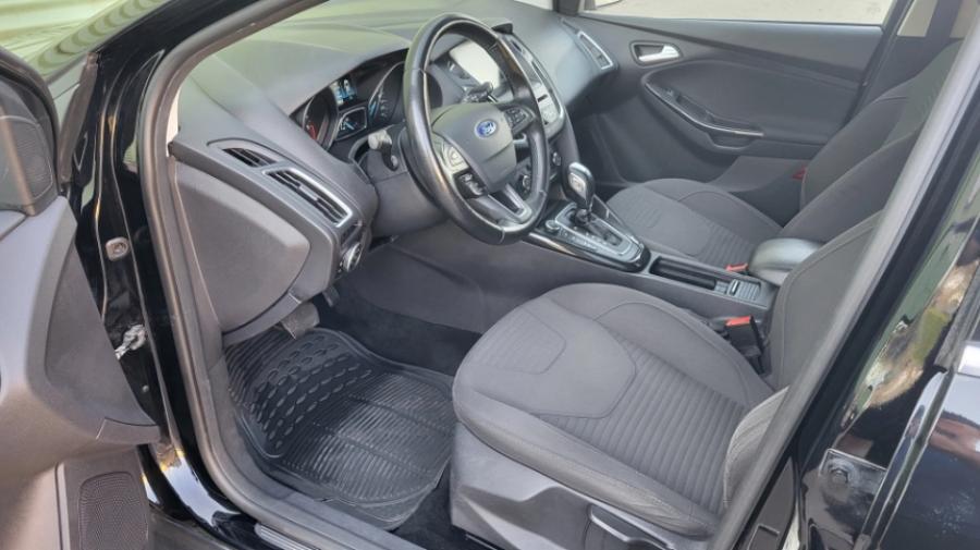 Black Ford Focus 2016 in Riga, with an engine capacity of 2.00 L and mileage of 260 thousand km for 5890 €, photo 11 on AUTOMOTO.COM.LV