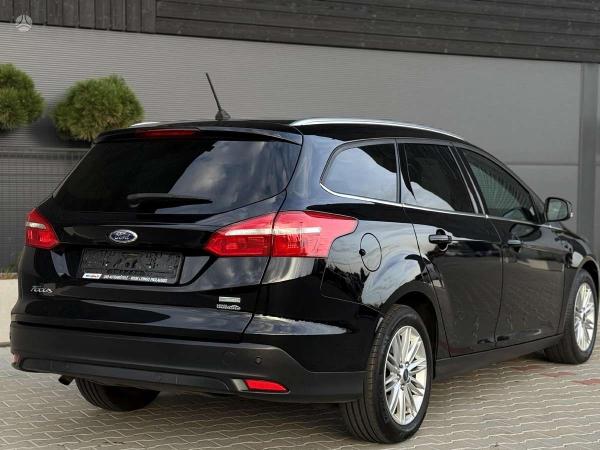Black Ford Focus 2018 in Siauliai, with an engine capacity of 1.00 L and mileage of 120 thousand km for 6450 €, photo 8 on AUTOMOTO.COM.LV