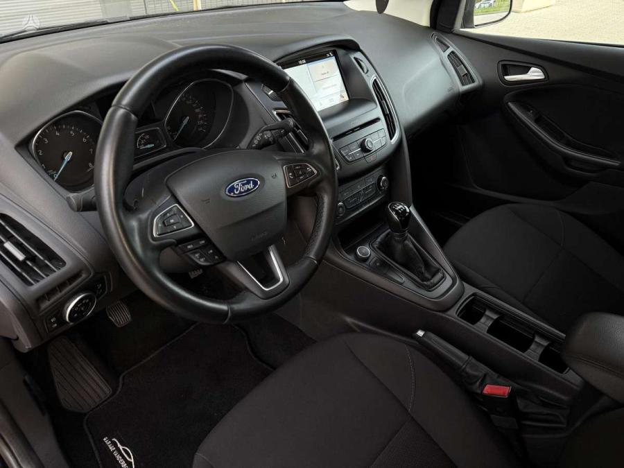 Black Ford Focus 2018 in Siauliai, with an engine capacity of 1.00 L and mileage of 120 thousand km for 6450 €, photo 12 on AUTOMOTO.COM.LV