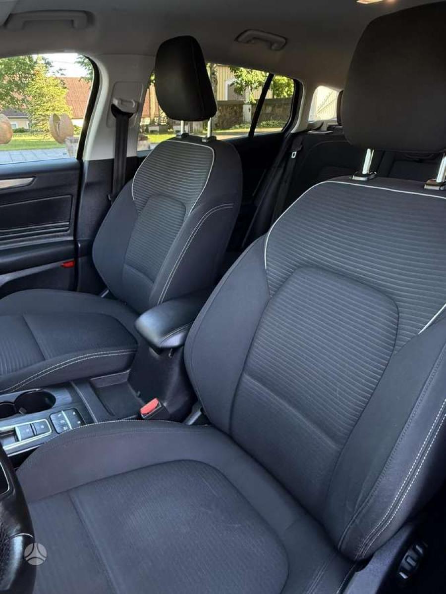 Black Ford Focus 2018 in Kaunas, with an engine capacity of 1.50 L and mileage of 215 thousand km for 7150 €, photo 15 on AUTOMOTO.COM.LV