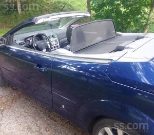 Blue Ford Focus 2009 in Liepaja, with an engine capacity of 2.00 L and mileage of 202 thousand km for 4200 €, photo 13 on AUTOMOTO.COM.LV