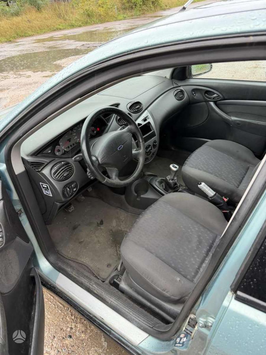 Blue Ford Focus 2000 in Kaunas, with an engine capacity of 1.80 L and mileage of 245 thousand km for 359 €, photo 7 on AUTOMOTO.COM.LV