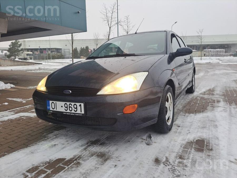 Blue Ford Focus 2001 in Jekabpils, with an engine capacity of 1.60 L and mileage of 214 thousand km for 1100 €, photo 8 on AUTOMOTO.COM.LV