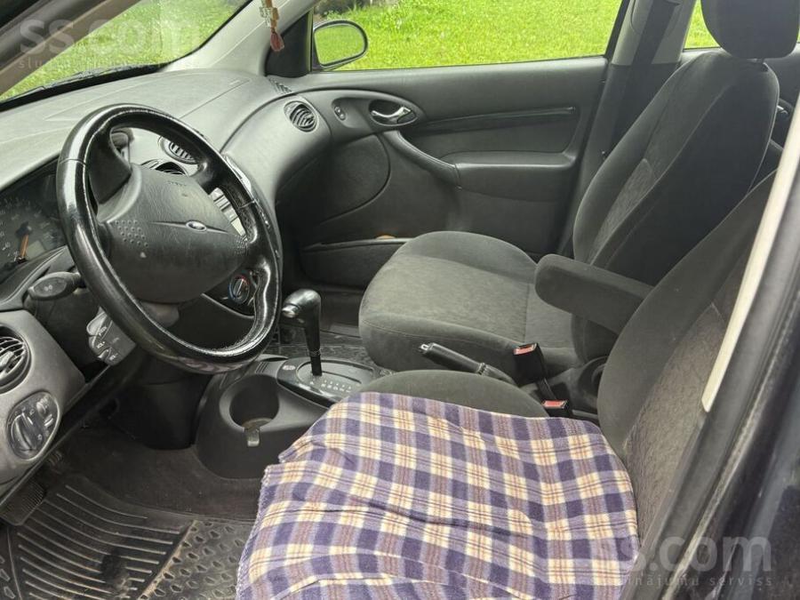 Blue Ford Focus 2001 in Riga, with an engine capacity of 1.60 L and mileage of 213 thousand km for 1100 €, photo 7 on AUTOMOTO.COM.LV