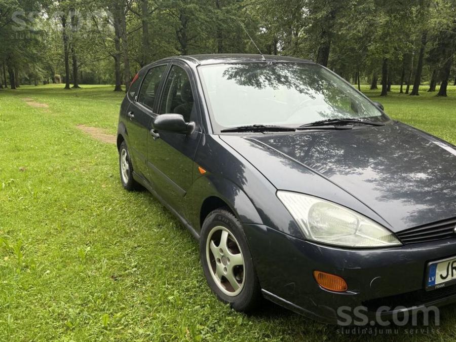 Blue Ford Focus 2001 in Riga, with an engine capacity of 1.60 L and mileage of 213 thousand km for 1100 €, photo 11 on AUTOMOTO.COM.LV