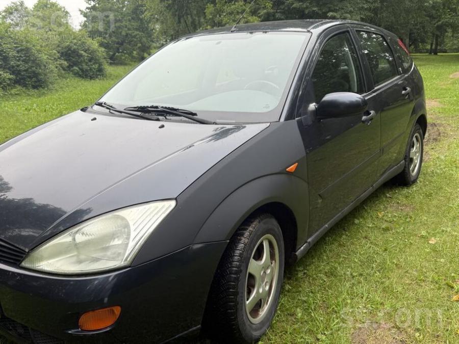 Blue Ford Focus 2001 in Riga, with an engine capacity of 1.60 L and mileage of 213 thousand km for 1100 €, photo 12 on AUTOMOTO.COM.LV