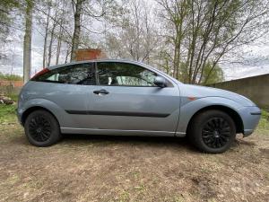 Zils Ford Focus 2004 Rīga, ar dzinēja tilpumu 1.40 L un nobraukumu 204 tūkst. km par 990 €, foto 4 vietnē AUTOMOTO.COM.LV