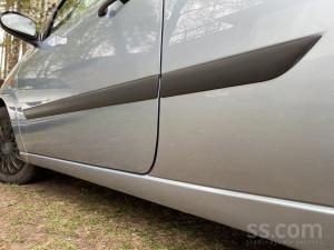 Zils Ford Focus 2004 Rīga, ar dzinēja tilpumu 1.40 L un nobraukumu 204 tūkst. km par 990 €, foto 10 vietnē AUTOMOTO.COM.LV