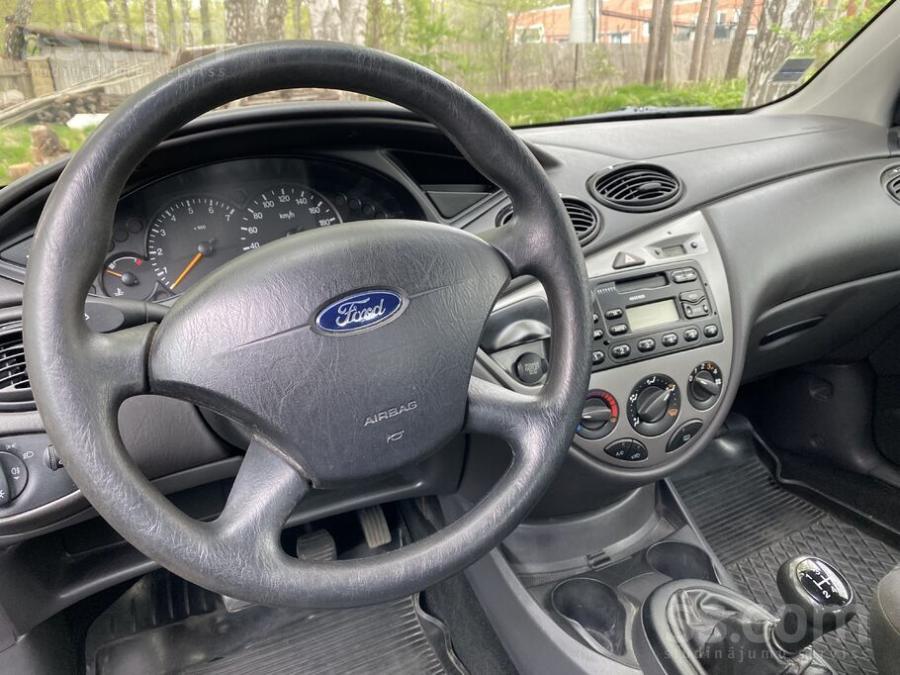 Zils Ford Focus 2004 Rīga, ar dzinēja tilpumu 1.40 L un nobraukumu 204 tūkst. km par 990 €, foto 11 vietnē AUTOMOTO.COM.LV