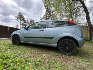 Blue Ford Focus 2004 in Riga, with an engine capacity of 1.40 L and mileage of 204 thousand km for 850 €, photo 18 on AUTOMOTO.COM.LV