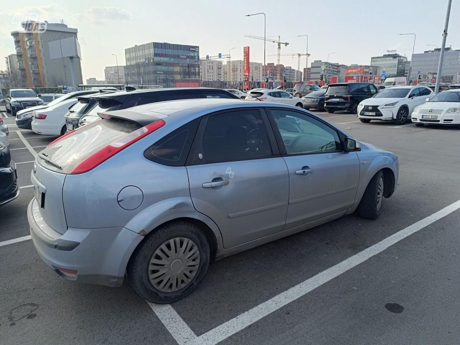 Blue Ford Focus 2006 in Vilnius, with an engine capacity of 1.60 L and mileage of 224 thousand km for 999 €, photo 24 on AUTOMOTO.COM.LV