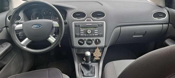Blue Ford Focus 2007 in Vilnius, with an engine capacity of 1.39 L and mileage of 118 thousand km for 1200 €, photo 3 on AUTOMOTO.COM.LV