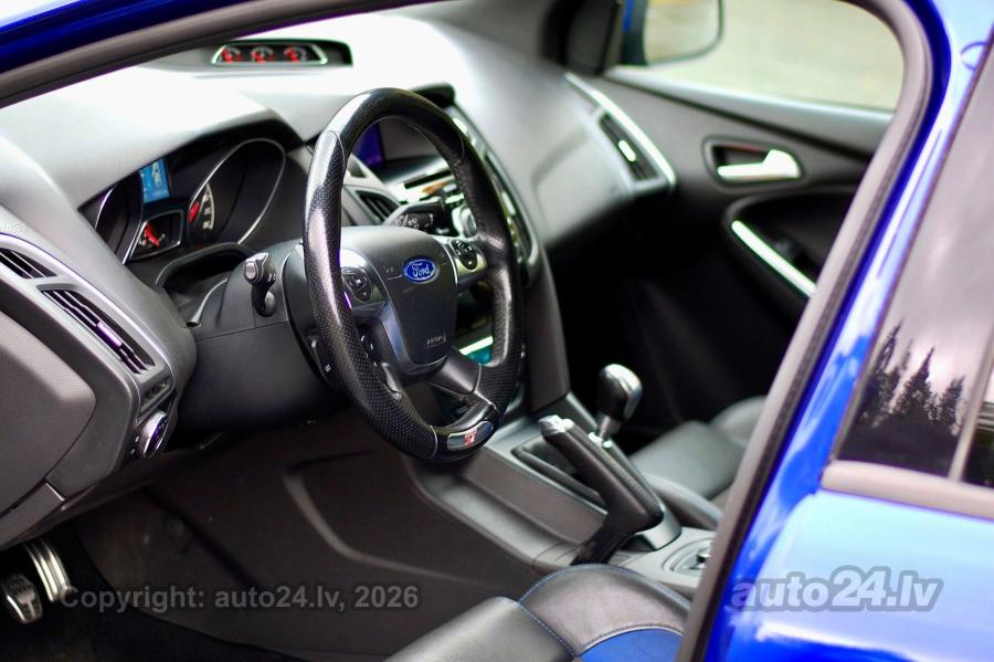 Blue Ford Focus 2013 in Tallinn, with an engine capacity of 2.00 L and mileage of 190 thousand km for 12900 €, photo 9 on AUTOMOTO.COM.LV