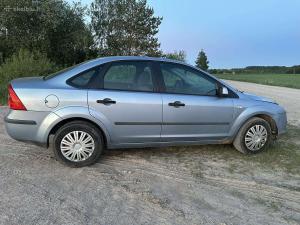 Blue Ford Focus 2006 in Prienai, with an engine capacity of 1.60 L and mileage of 280 thousand km for 650 €, photo 8 on AUTOMOTO.COM.LV