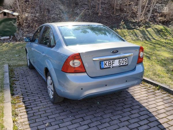 Blue Ford Focus 2008 in Alytus, with an engine capacity of 1.60 L and mileage of 191 thousand km for 950 €, photo 8 on AUTOMOTO.COM.LV