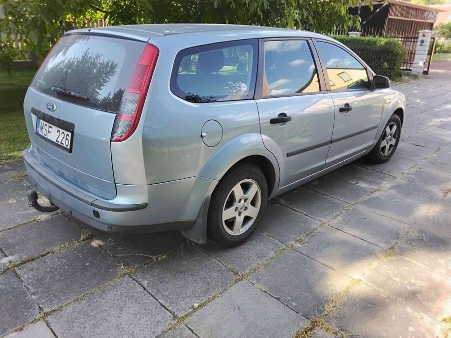 Blue Ford Focus 2006 in Vilnius, with an engine capacity of 1.60 L and mileage of 320 thousand km for 1300 €, photo 7 on AUTOMOTO.COM.LV