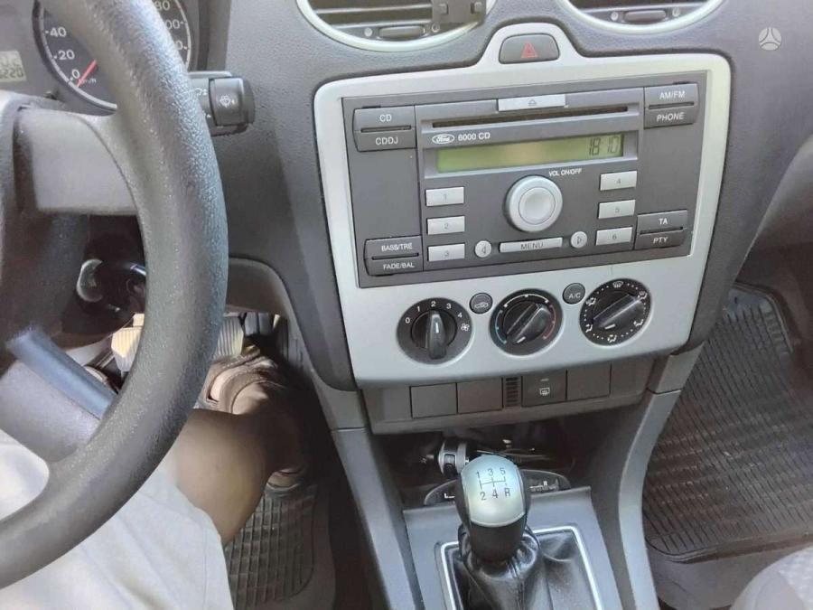 Blue Ford Focus 2006 in Vilnius, with an engine capacity of 1.60 L and mileage of 320 thousand km for 1300 €, photo 11 on AUTOMOTO.COM.LV
