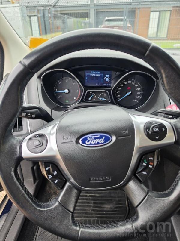 Blue Ford Focus 2011 in Riga, with an engine capacity of 1.60 L and mileage of 286 thousand km for 4100 €, photo 8 on AUTOMOTO.COM.LV