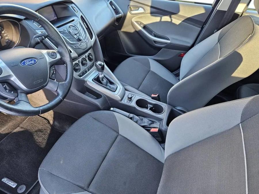 Blue Ford Focus 2012 in Jekabpils, with an engine capacity of 1.60 L and mileage of 257 thousand km for 4490 €, photo 13 on AUTOMOTO.COM.LV