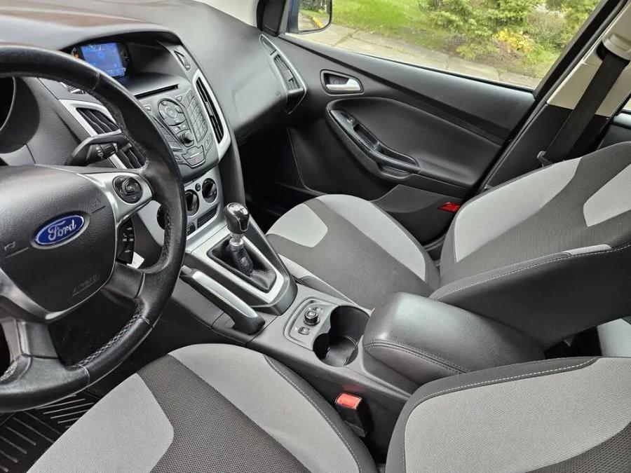 Blue Ford Focus 2012 in Jekabpils, with an engine capacity of 1.60 L and mileage of 276 thousand km for 4590 €, photo 14 on AUTOMOTO.COM.LV